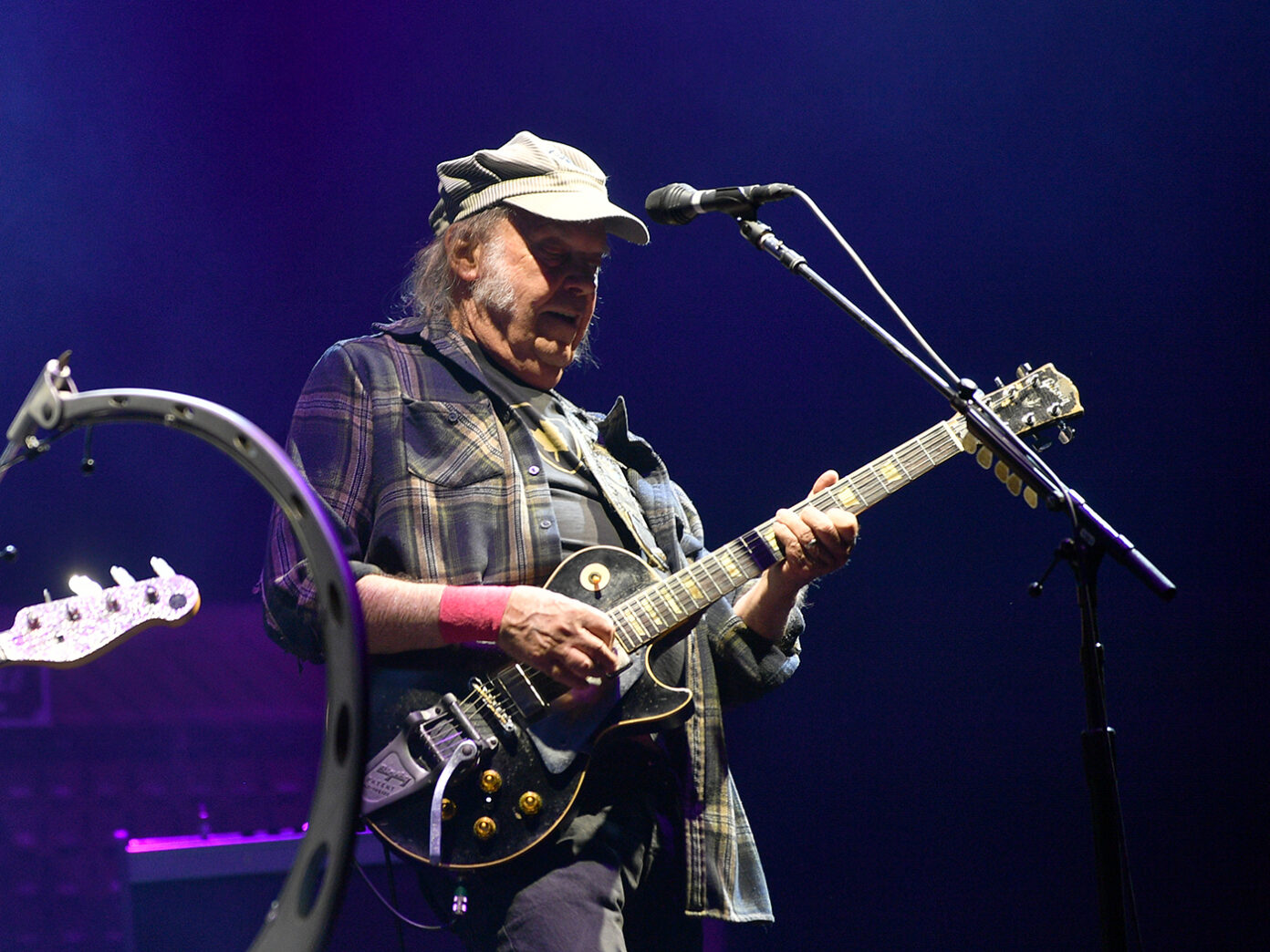 Watch Neil Young play new song, "Big Crime" - UNCUT